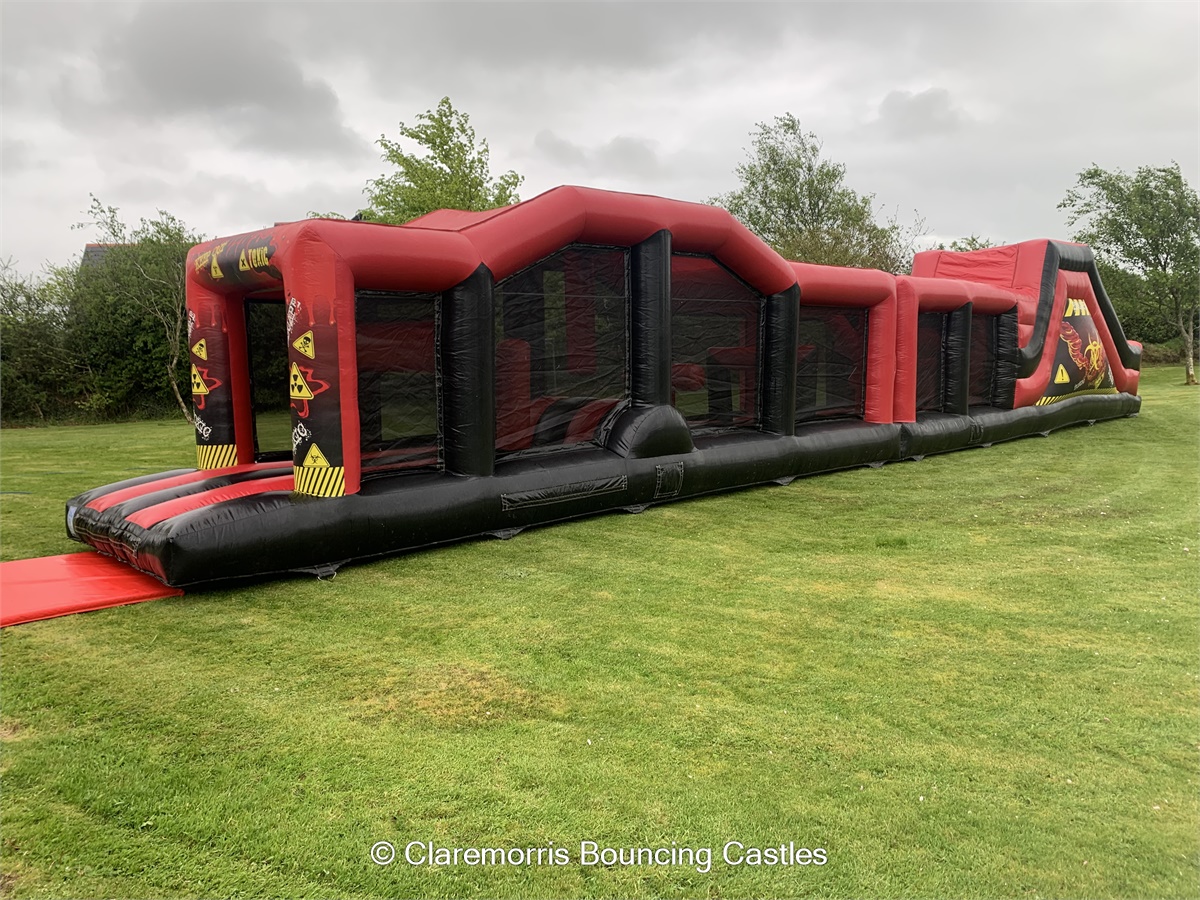 60 Foot Red Toxic Obstacle Course - Bouncy Castle / Inflatable hire in ...